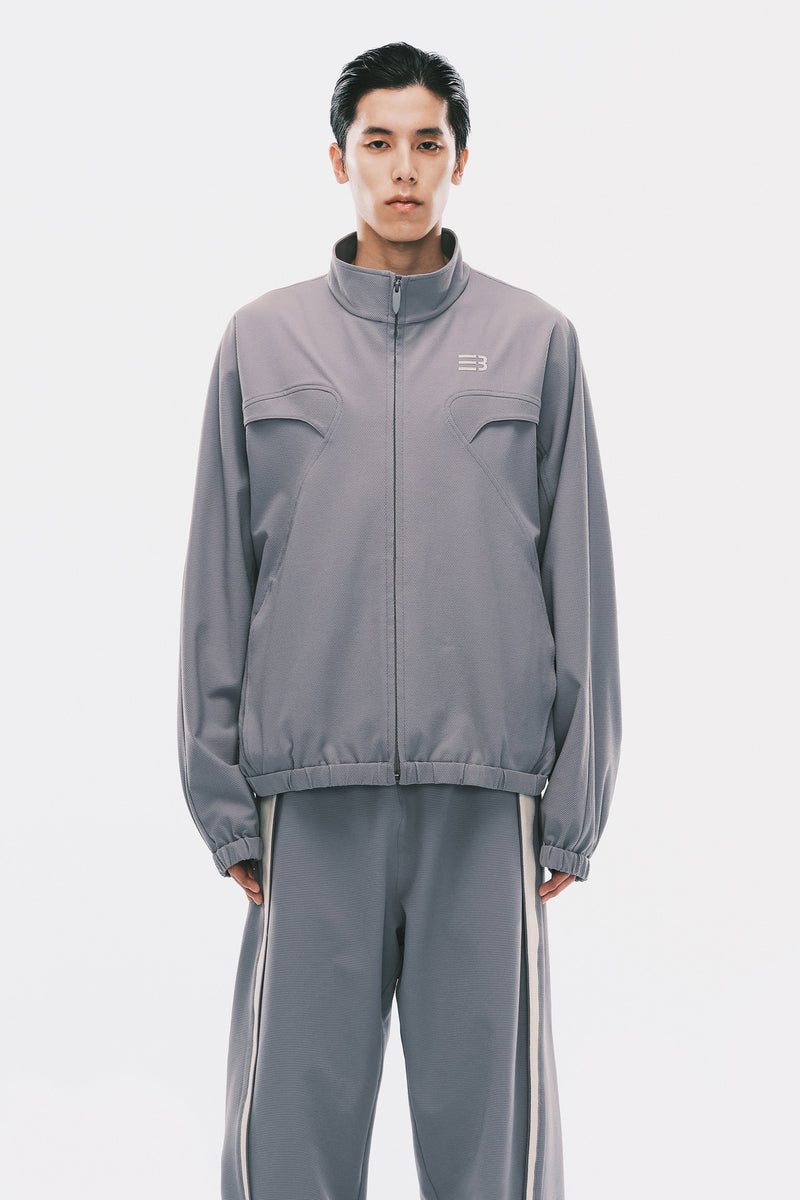 KINFOLK TRACK JACKET GHOST GREY
